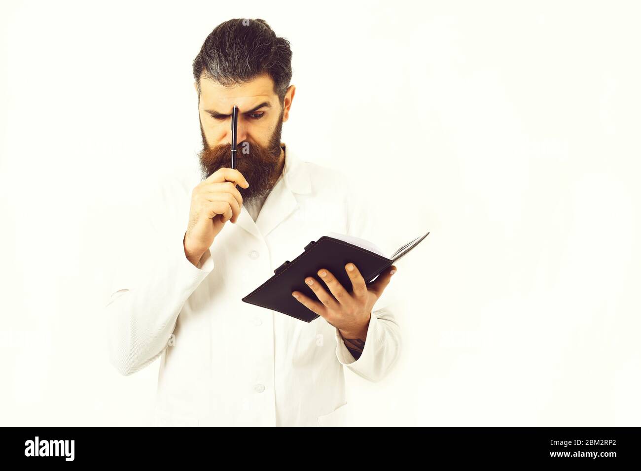 Bearded man, long beard. Brutal caucasian doctor or unshaven hipster ...