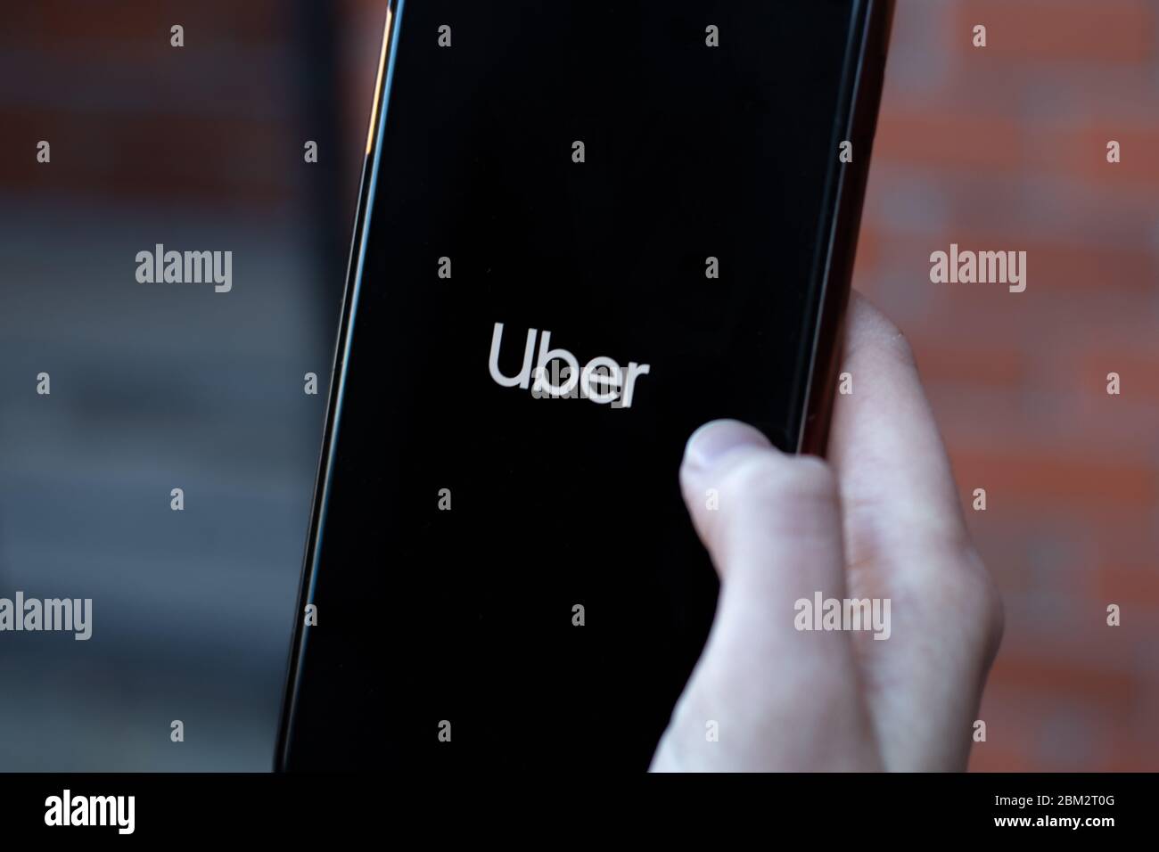New York, USA - 1 May 2020: Uber app logo close-up on phone screen ...