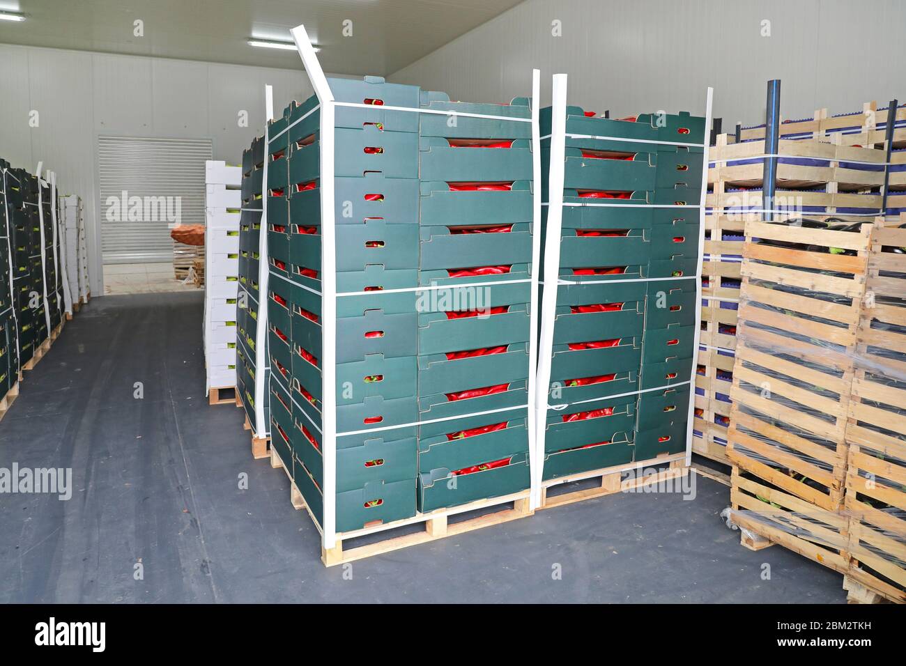 Fruits and Vegetables in Crates at Pallets Storage Warehouse Stock ...