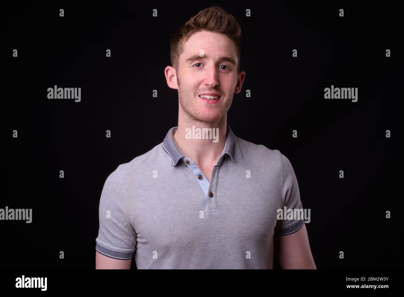 Caucasian man smiling black shirt hi-res stock photography and images ...