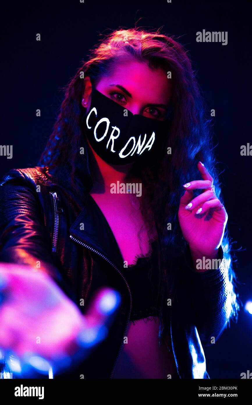 Portrait of a Beckoning Attractive Girl Wearing Black Protective Mask ...