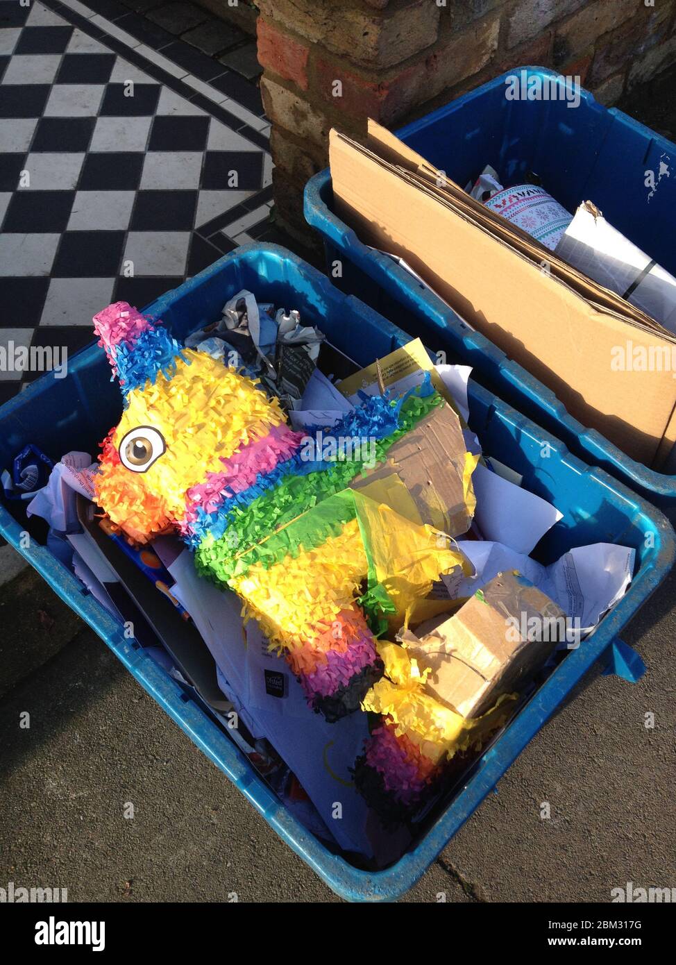 Paper recycle recycling bin skip with papers and card and cardboard and ...