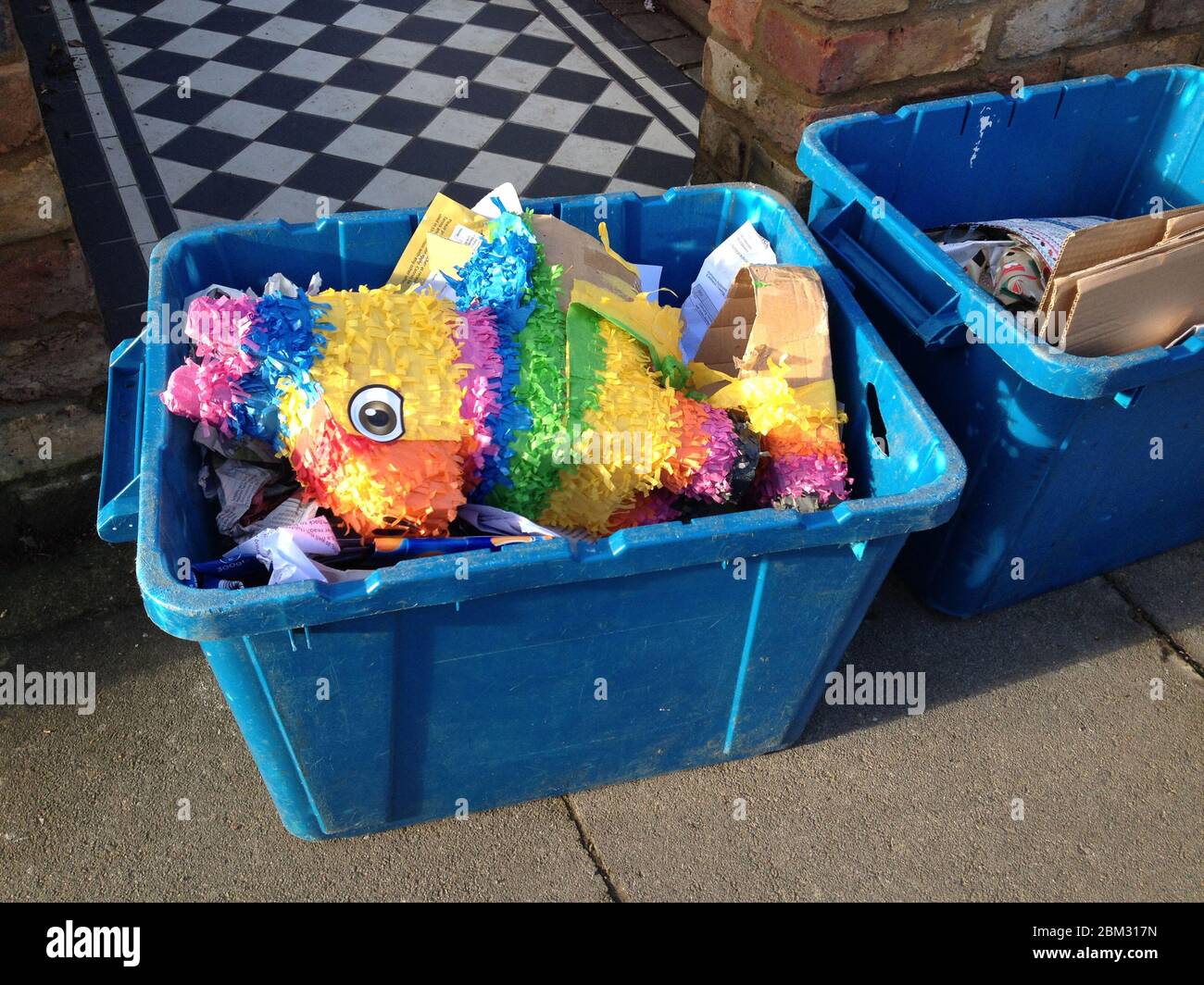 Paper recycle recycling bin skip with papers and card and cardboard and ...