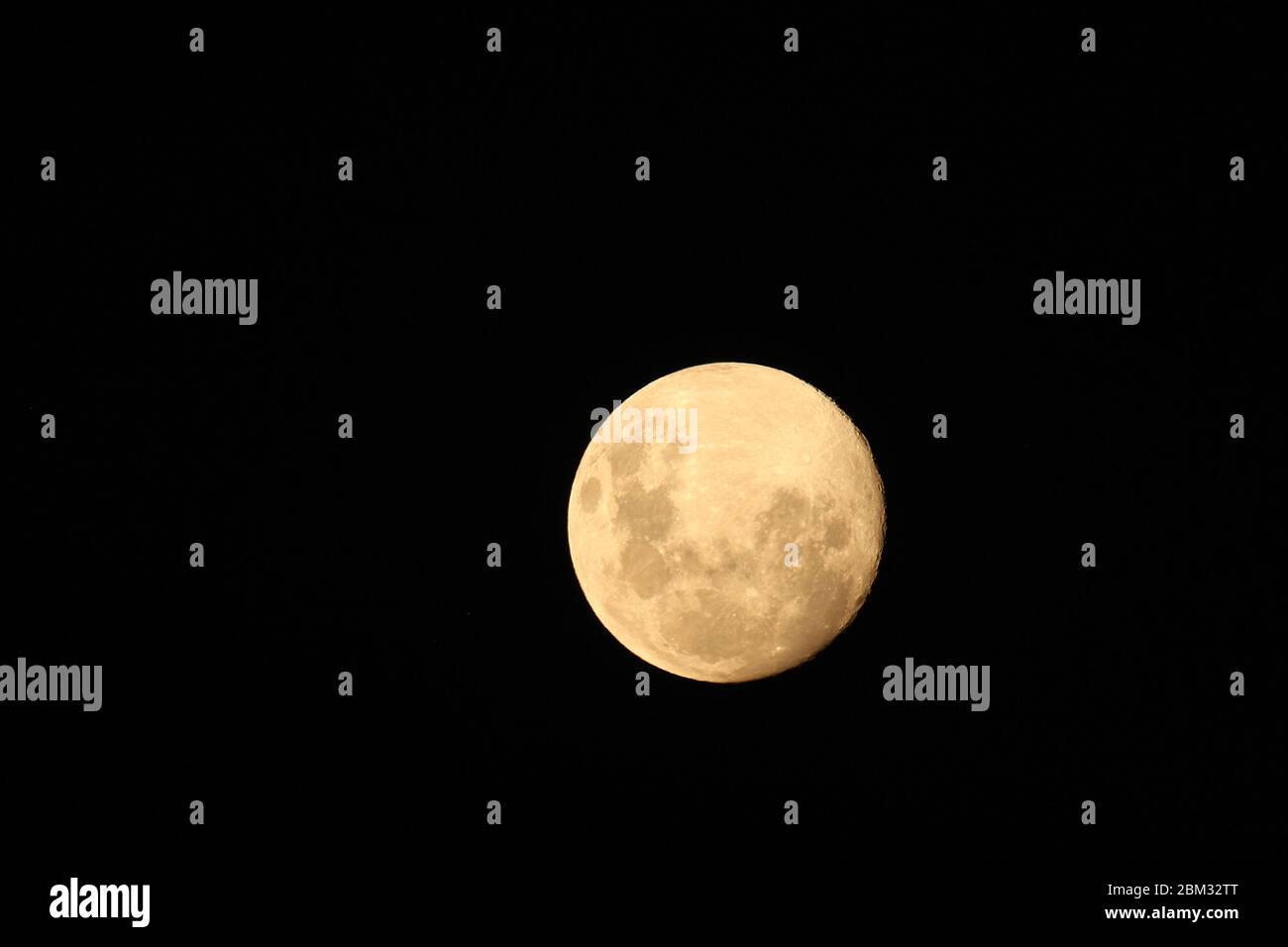Full moon rising Stock Photo - Alamy