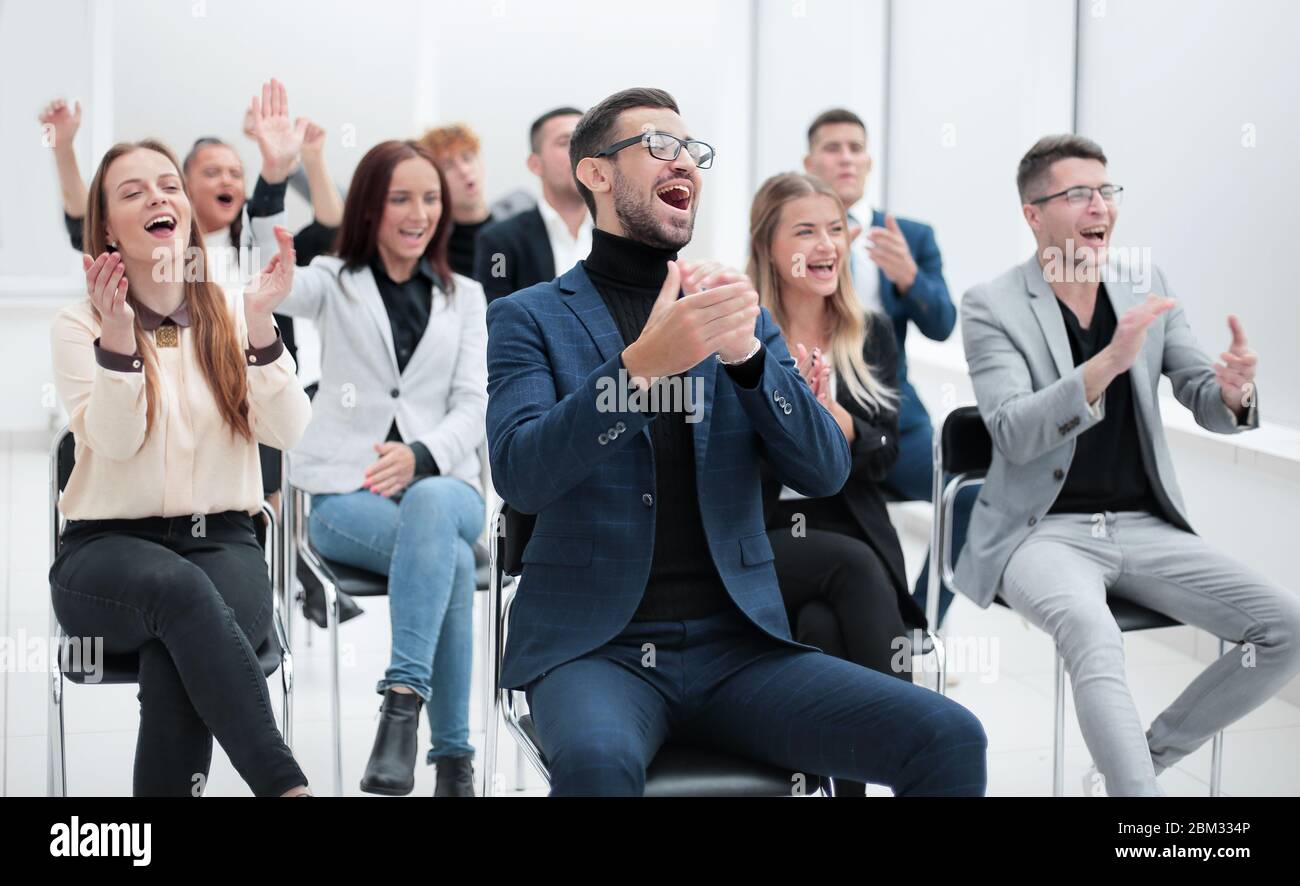 group of happy young people applauding during the seminar Stock Photo ...