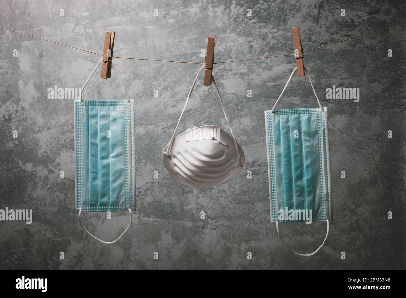 Single use respiratory protective masks being washed and reused due to ...