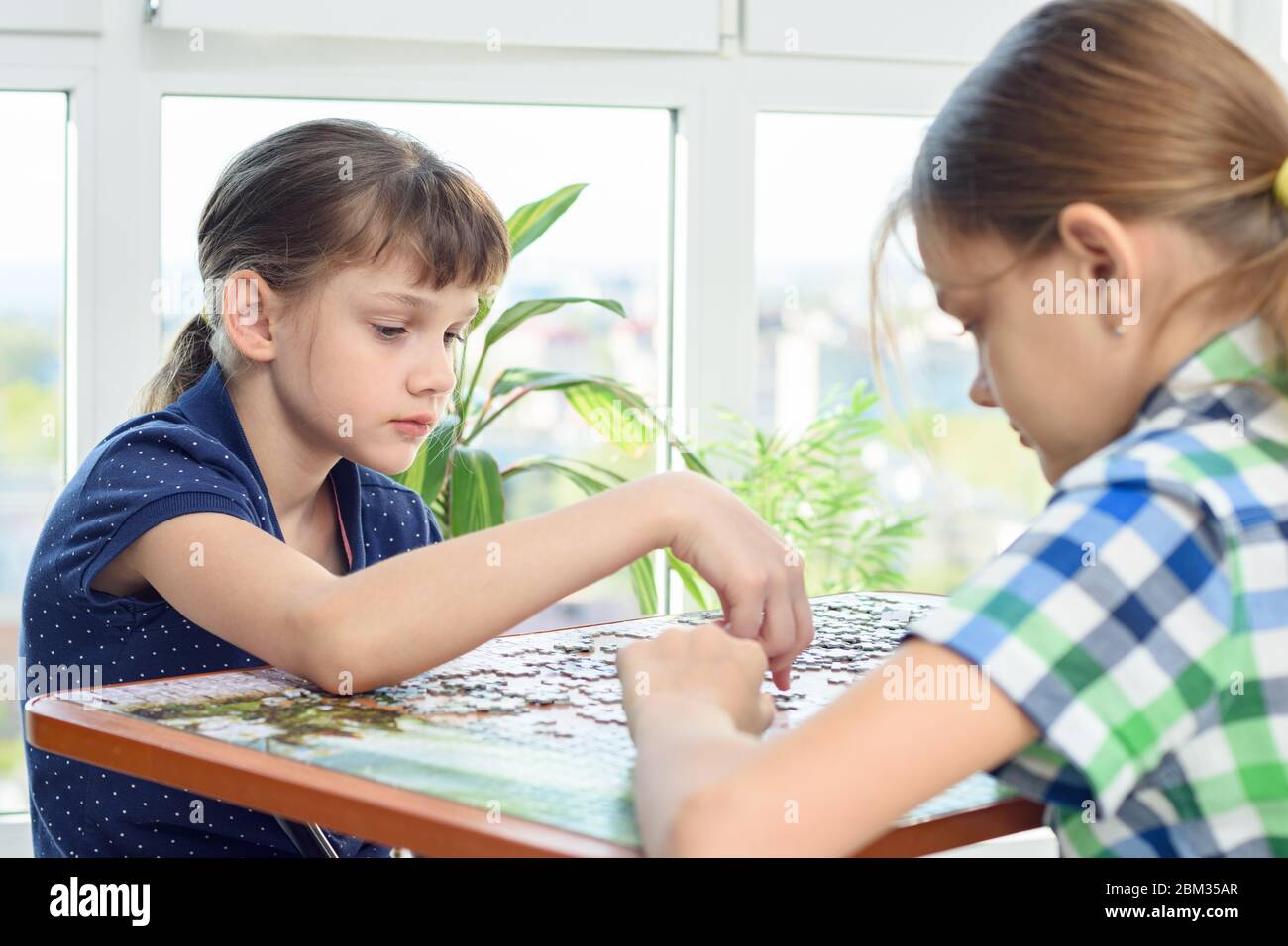 Children at home spend their free time at the weekend Stock Photo - Alamy