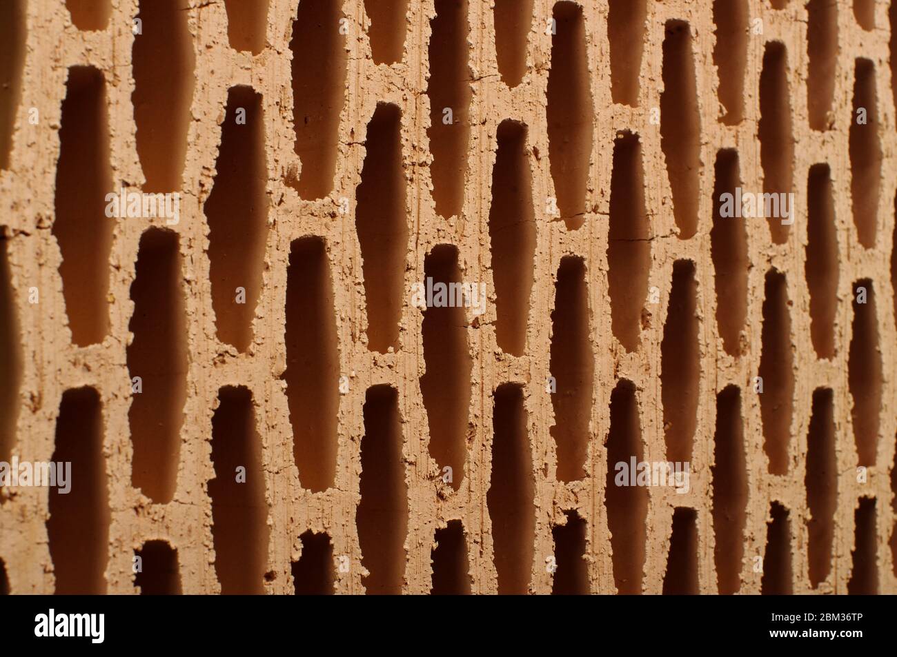 Abstract close up of ceramic building block for house construction made ...