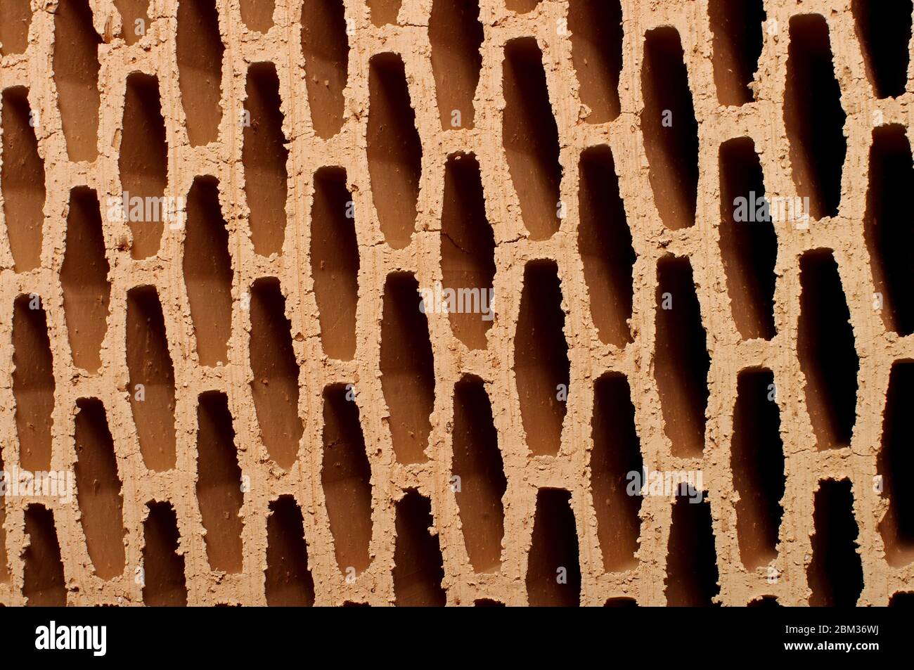 Abstract close up of ceramic building block for house construction made ...