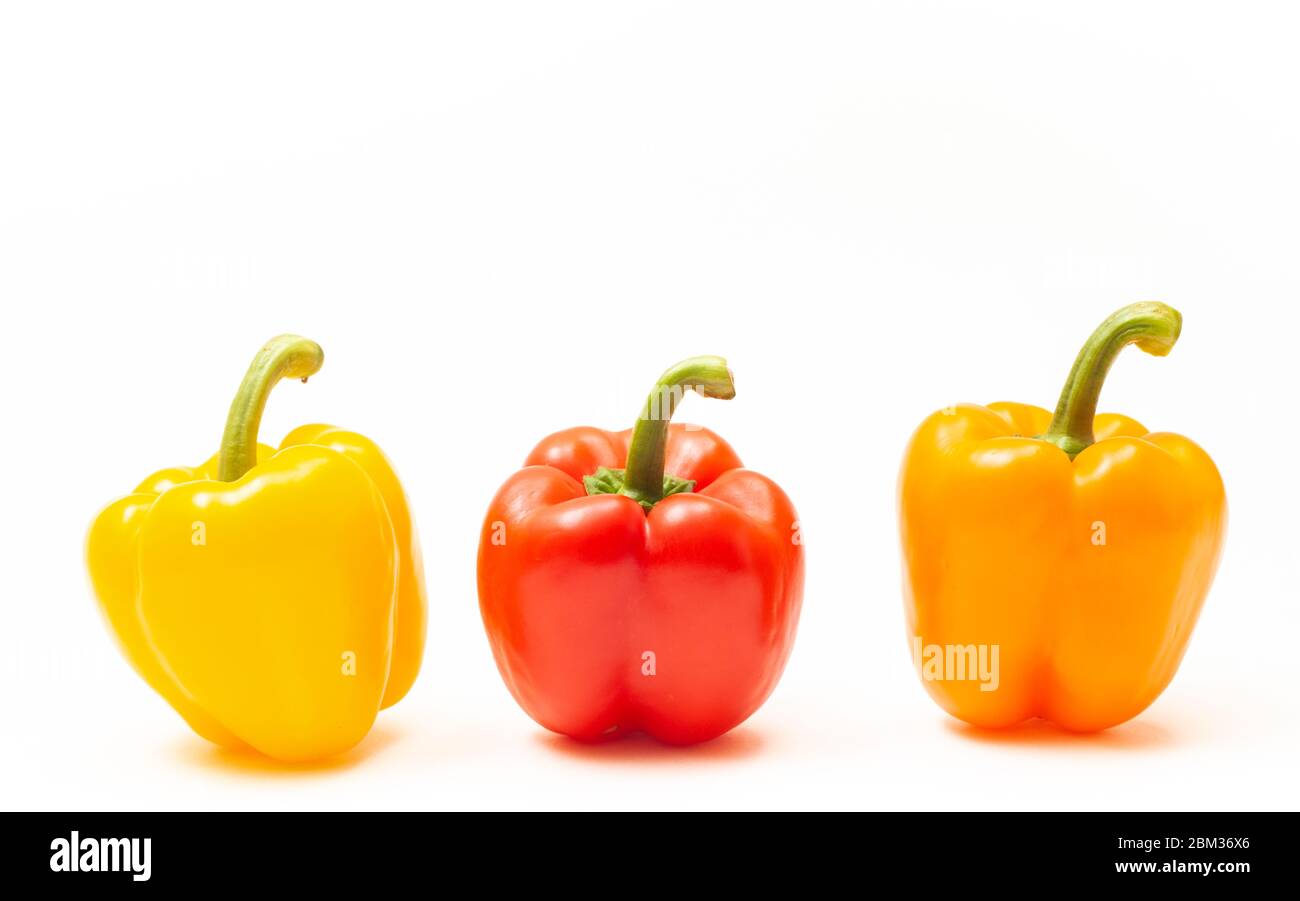 Variety of thre different colored bell peppers isolated on white Stock ...