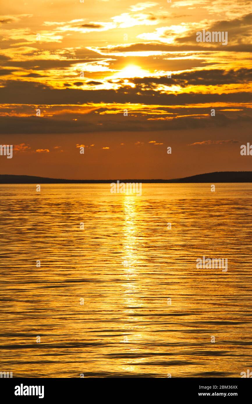 Golden Sunlight over a Lake Stock Photo - Alamy