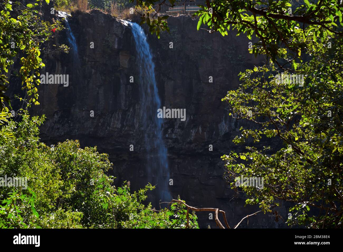 Waterfall in tropical rain forest Stock Photo - Alamy