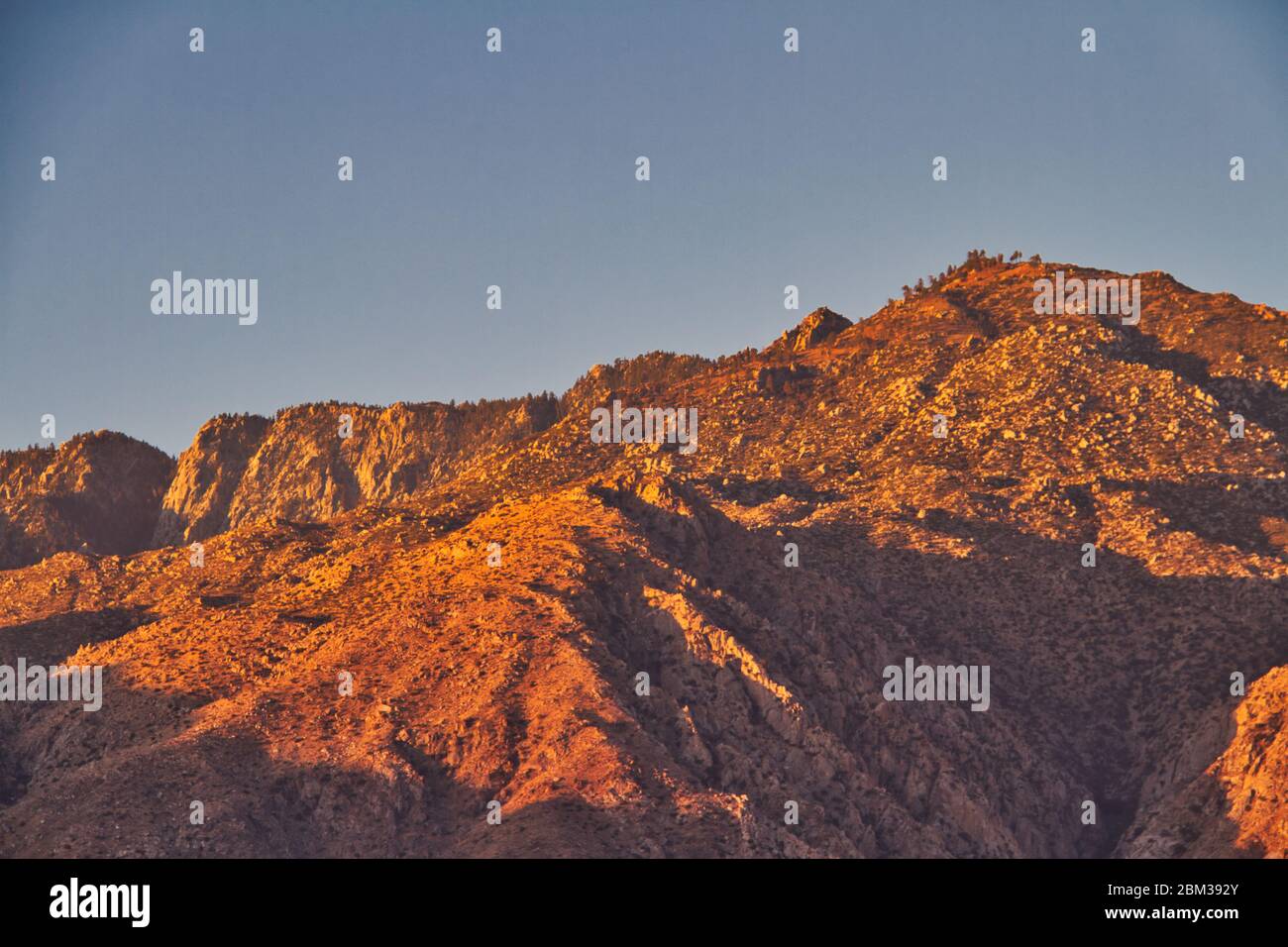 Alpine Glow on Desert Mountains Stock Photo - Alamy
