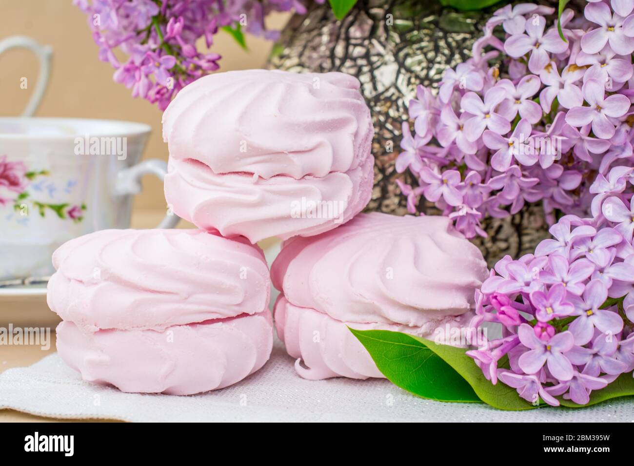 beautiful spring flowers and sweets Stock Photo - Alamy