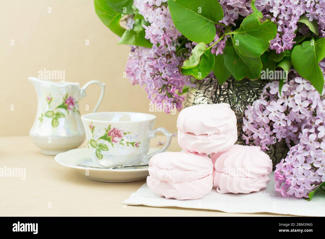 beautiful spring flowers and sweets Stock Photo - Alamy