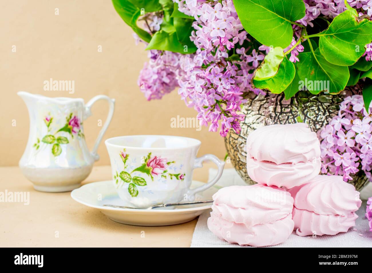 beautiful spring flowers and sweets Stock Photo - Alamy