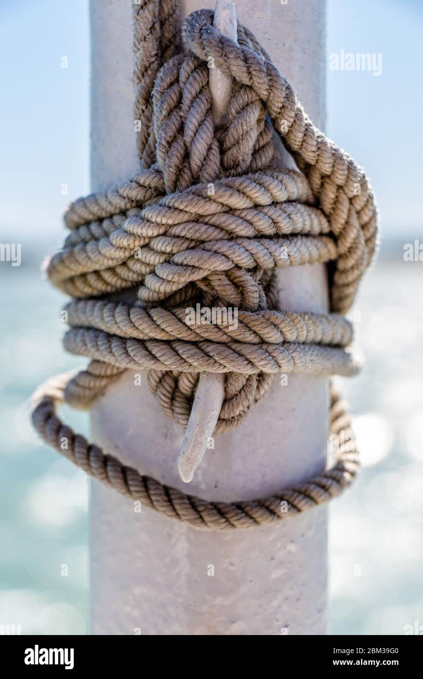 Rope wrapped around pole hi-res stock photography and images - Alamy