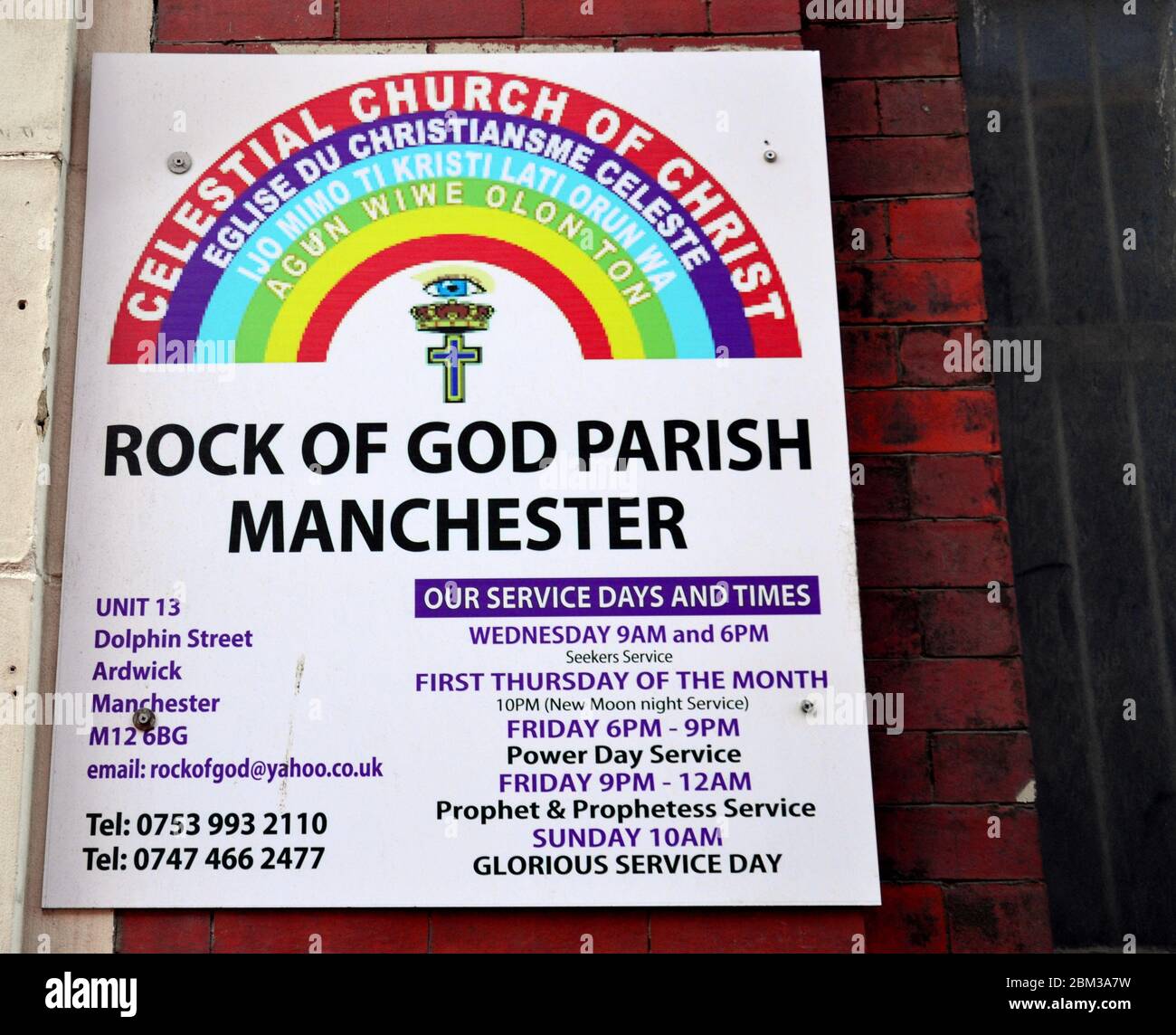 Sign for the Rock of God Parish Manchester church in Ardwick ...