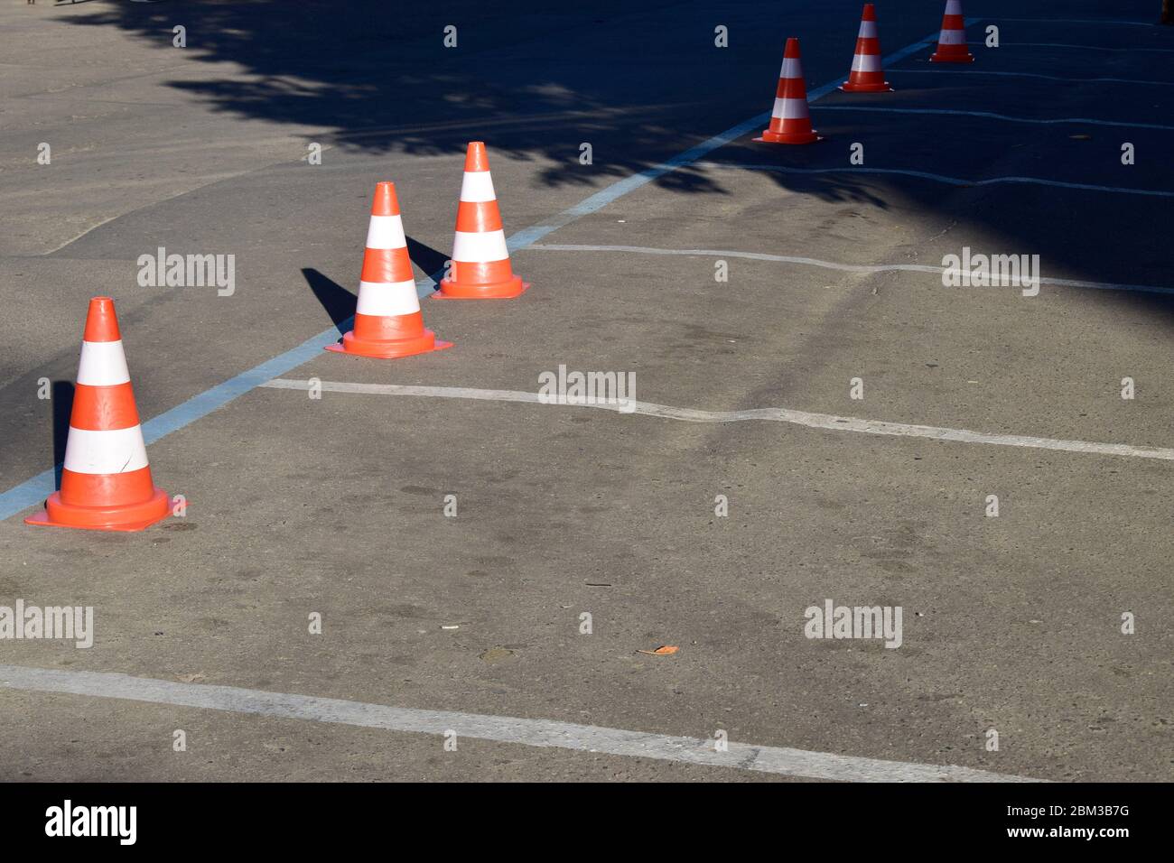 The sunlight on parking cone on the monochrome background. Plastic ...
