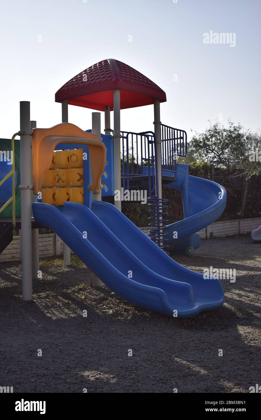 Children playground slide background hi-res stock photography and ...