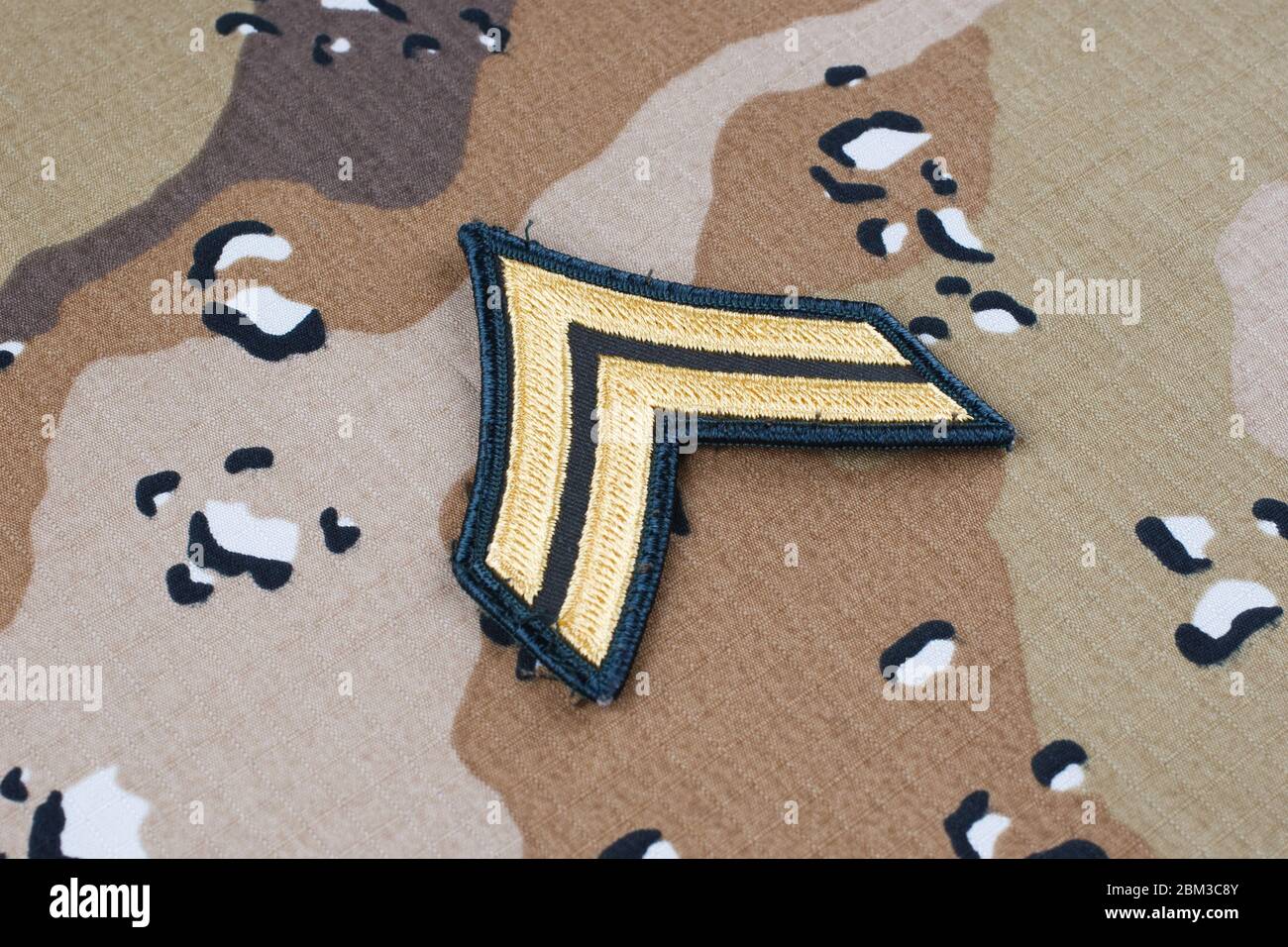May 12, 2018. US ARMY Corporal rank patch on desert camouflage uniform ...