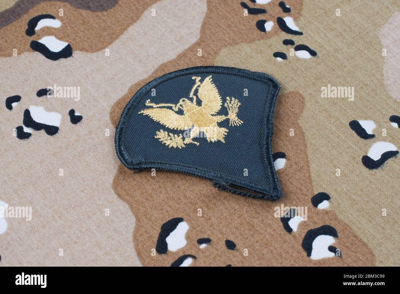 May 12, 2018. US ARMY Specialist rank patch on desert camouflage ...