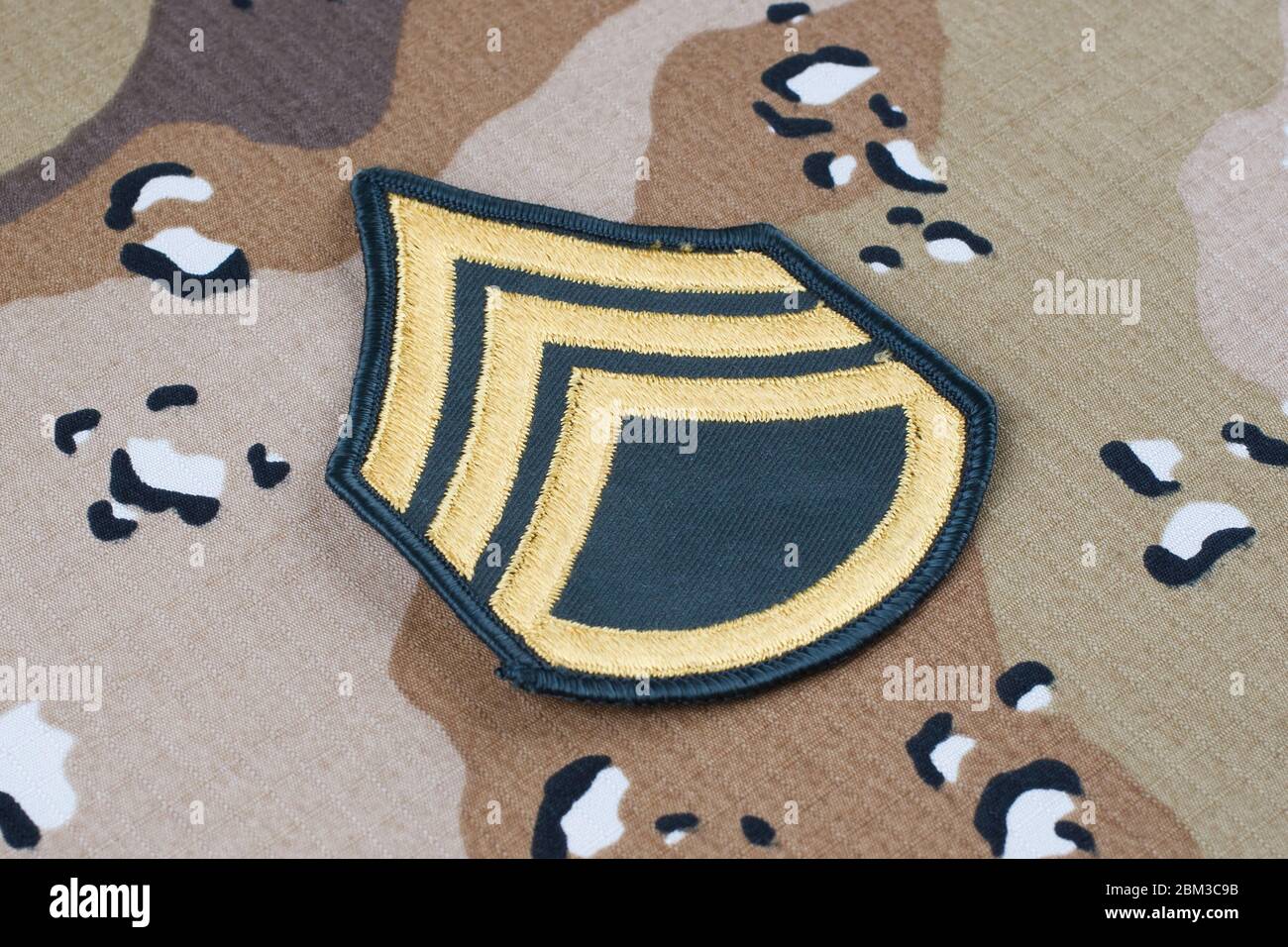 May 12, 2018. US ARMY Staff Sergeant rank patch on desert camouflage ...