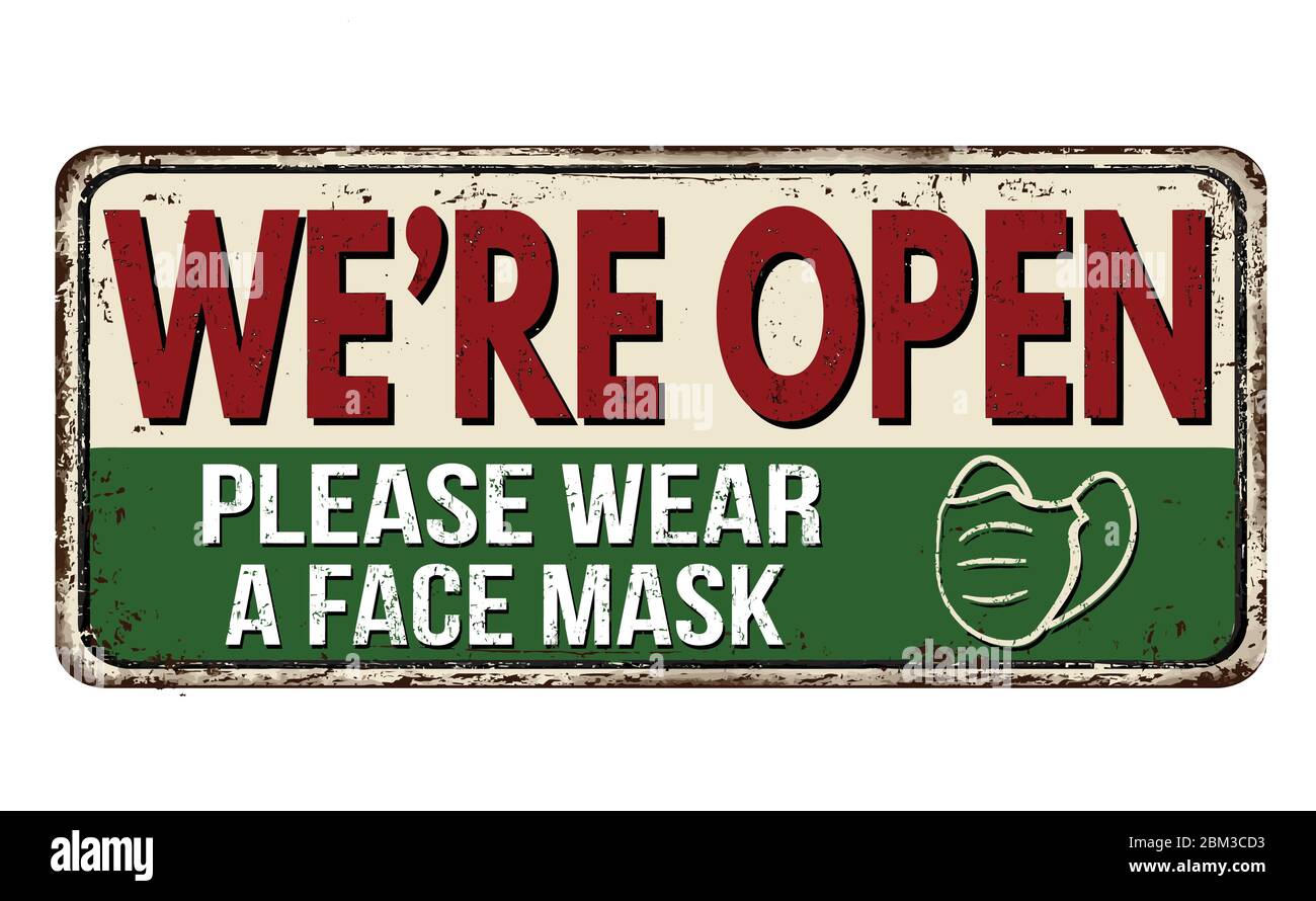 We're open, please wear a face mask vintage rusty metal sign on a white ...