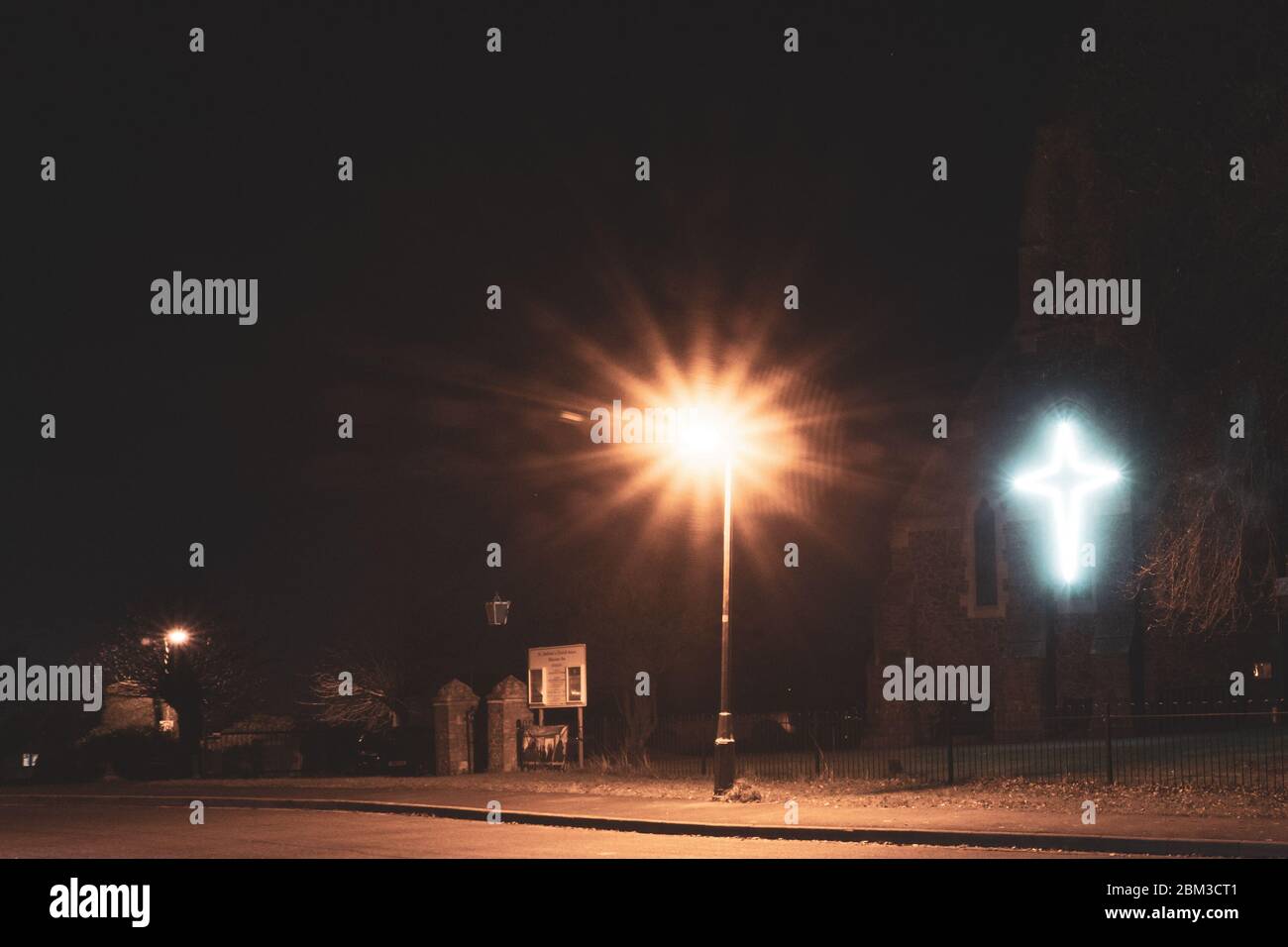 Glowing cross hi-res stock photography and images - Alamy