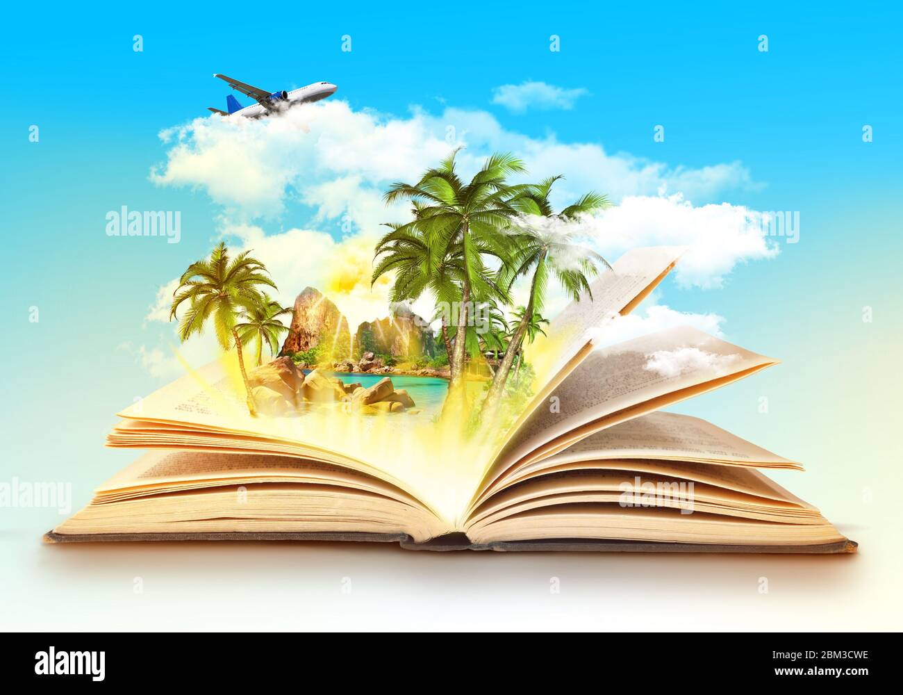 Old open book with tropical island beach with sea water and palm trees ...