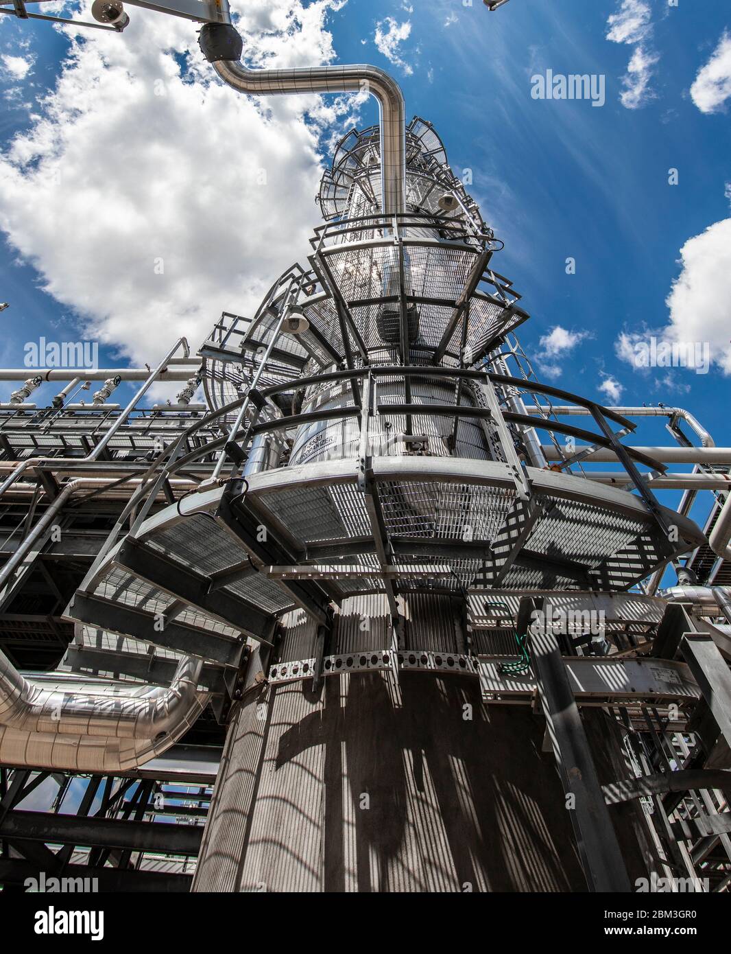 Natural gas processing plant structures with blue sky Stock Photo - Alamy