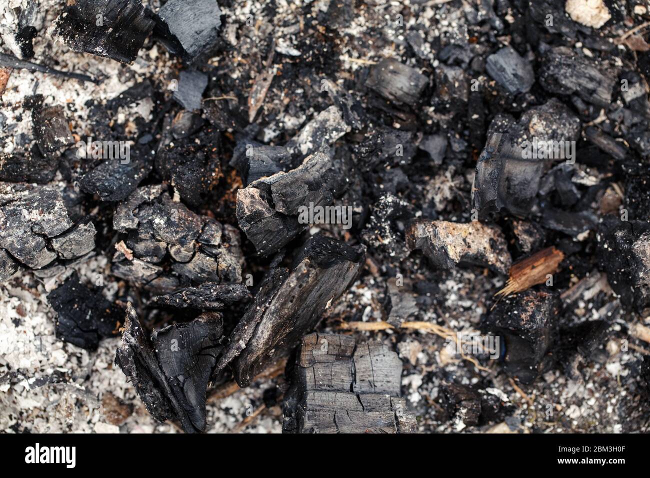 Natural ash charcoal fire place texture background. Closeup macro of ...