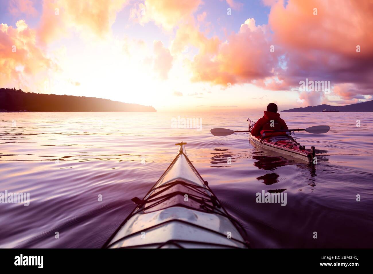 Adventurous Man Sea Kayaking in the Ocean Stock Photo - Alamy