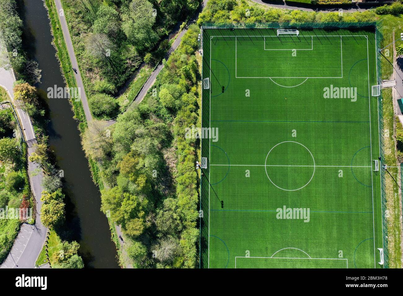 Overhead aerial drone view of football pitch and canal Stock Photo - Alamy