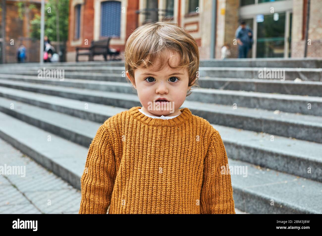 Portrait of a happy boy observing his surroundings Stock Photo - Alamy