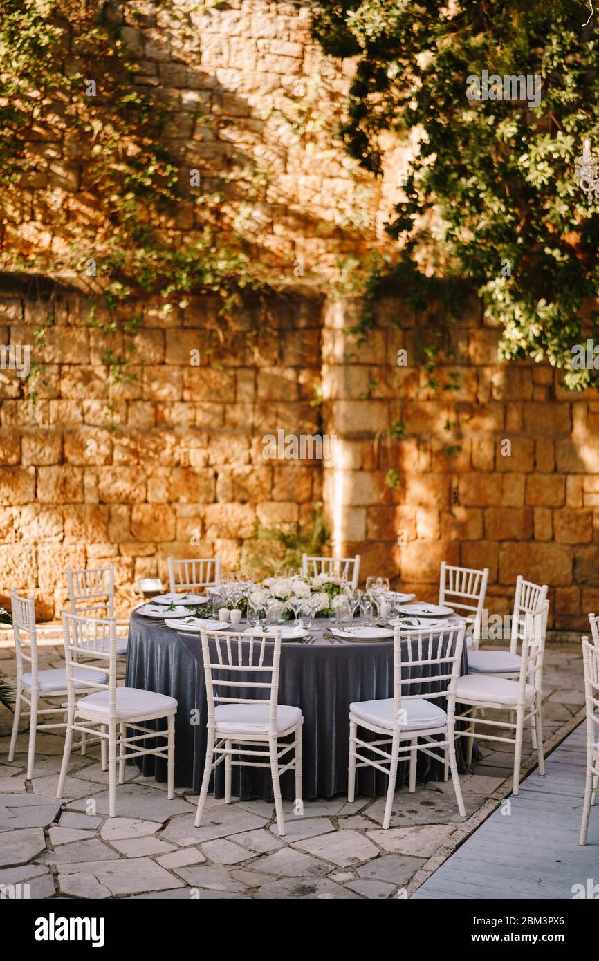 Wedding dinner table reception. Round banquet tables for guests with ...