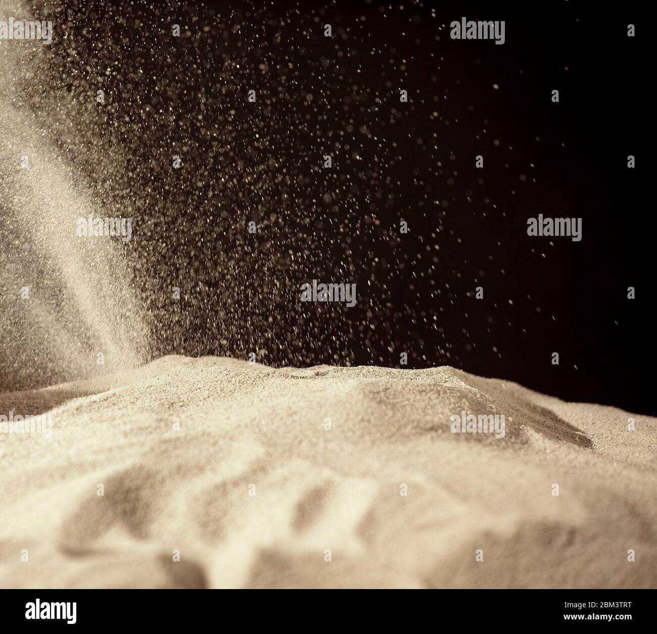 Freeze motion of dust particles on black background. Powder explosion ...