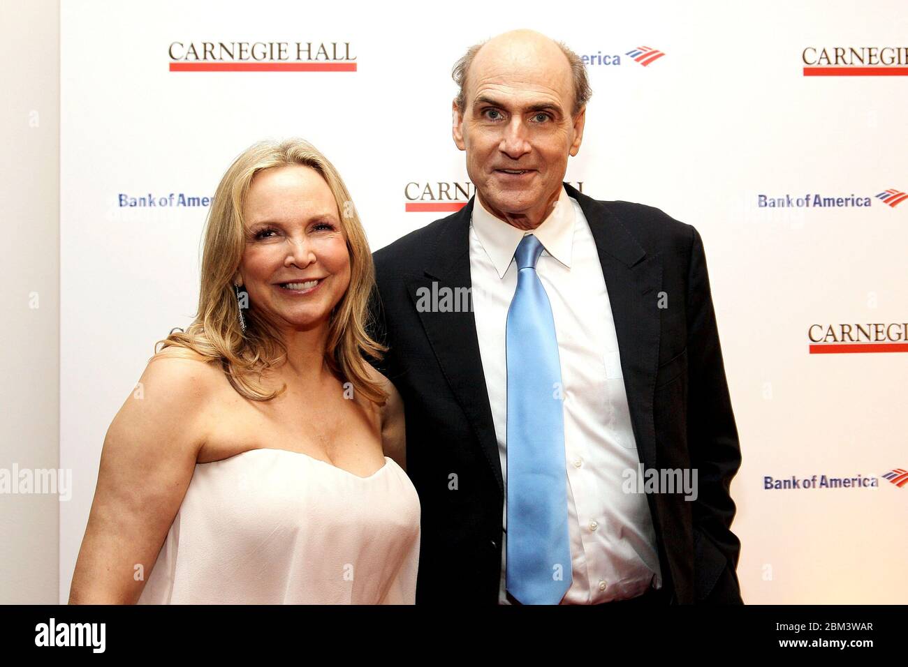 New York, NY, USA. 12 April, 2011. James Taylor, (R) and, his wife ...