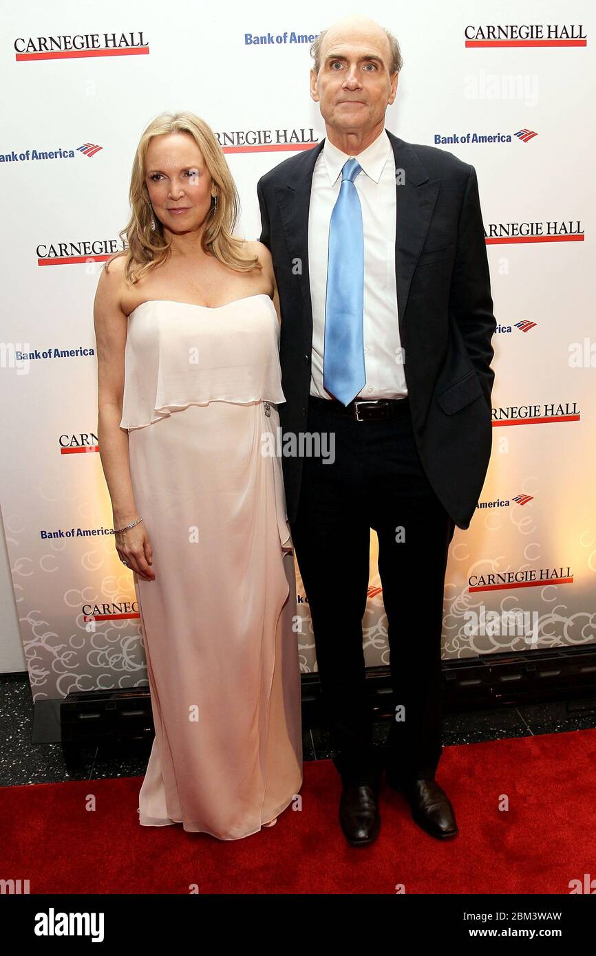 New York, NY, USA. 12 April, 2011. James Taylor, (R) and, his wife ...