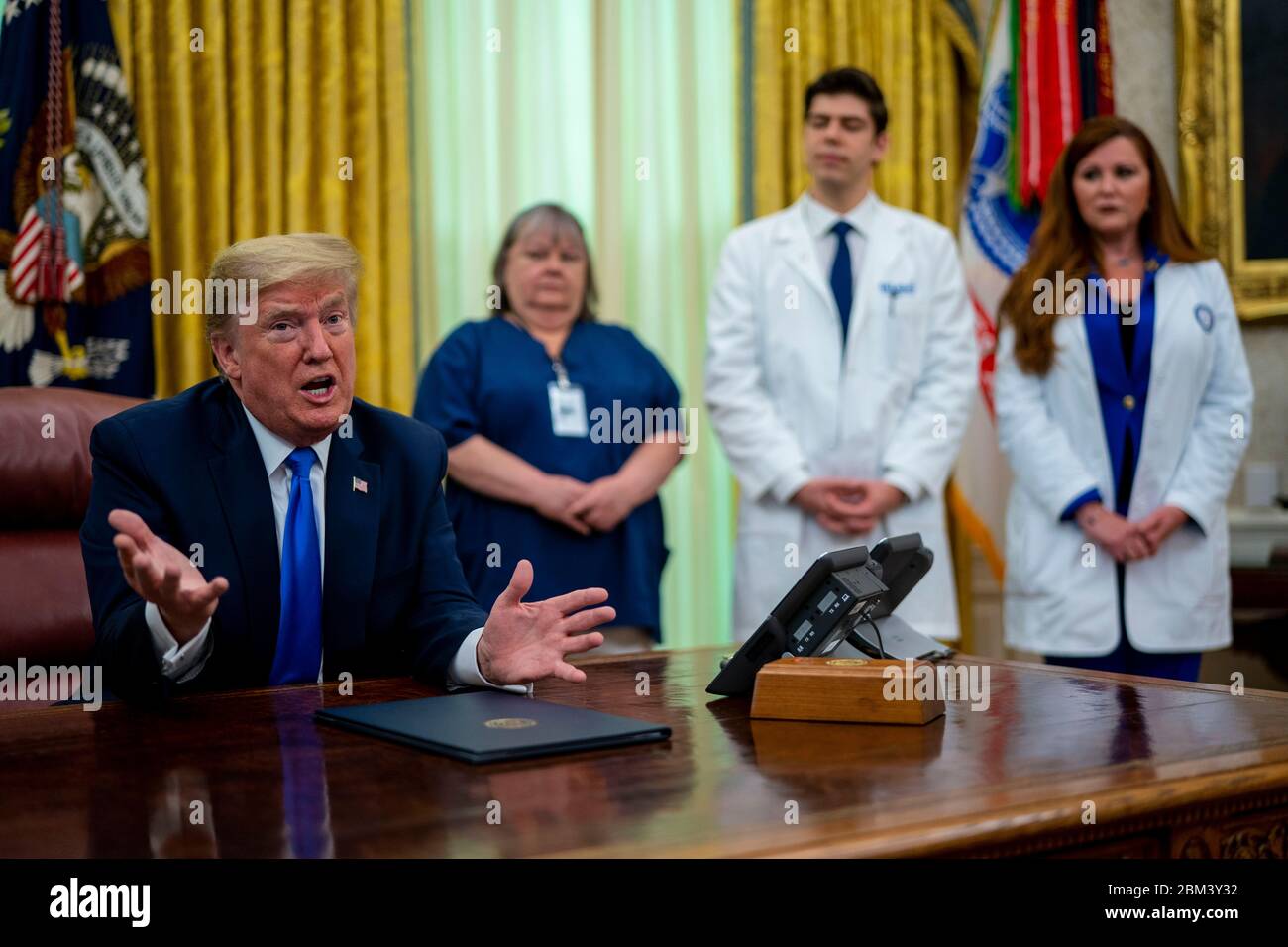United States President Donald J. Trump makes remarks as he signs a ...