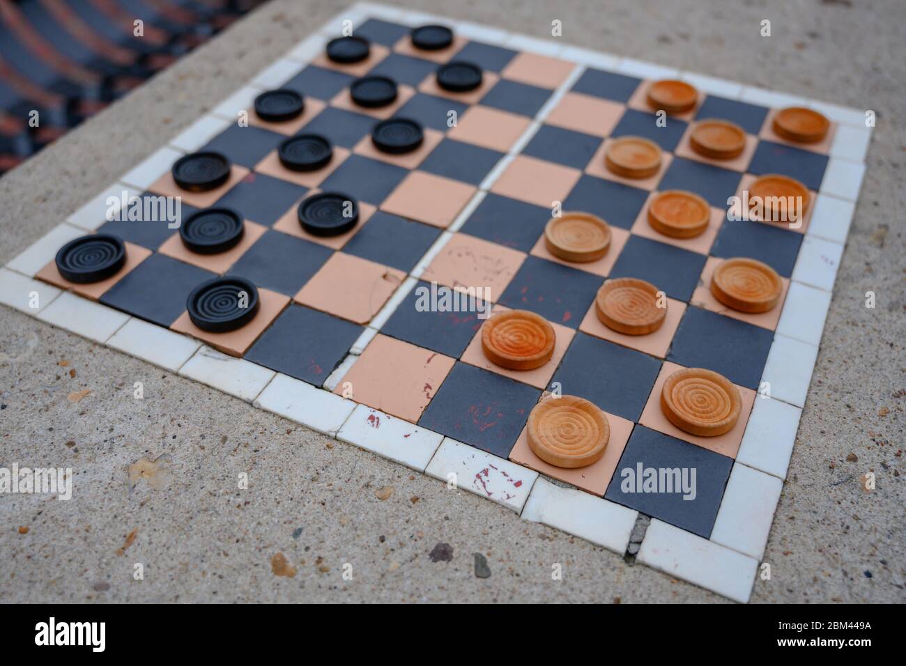 Public Checkerboard Ready to Play on outdoor table Stock Photo - Alamy