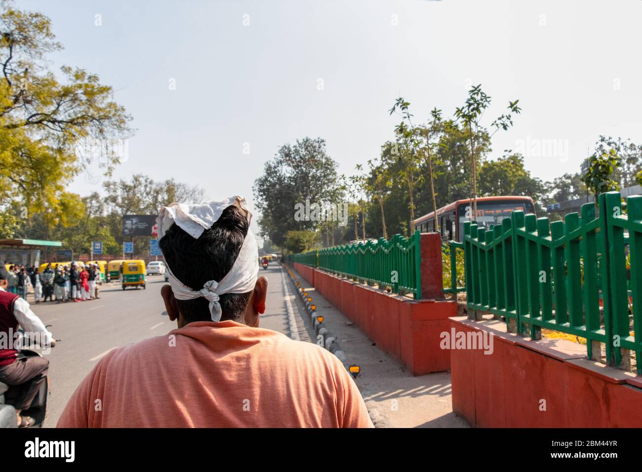 New Delhi, India - Feb, 2019. Rickshaw man wearing white cloth on his ...