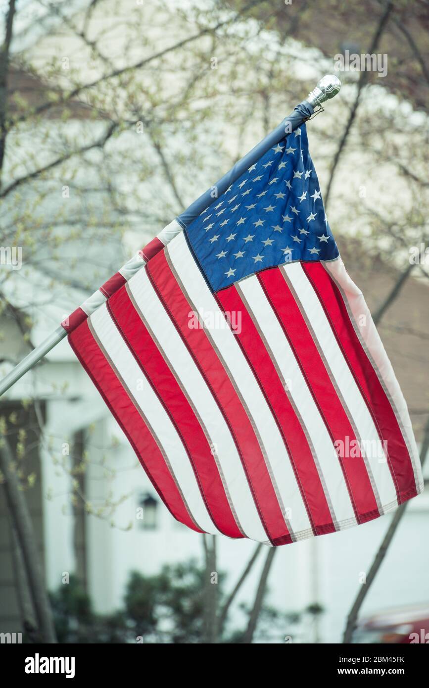 American flag front of house hi-res stock photography and images - Alamy