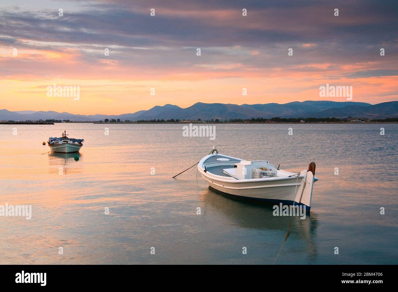 Fishing boats in Argolikos Bay in Peloponnese, Greece Stock Photo - Alamy