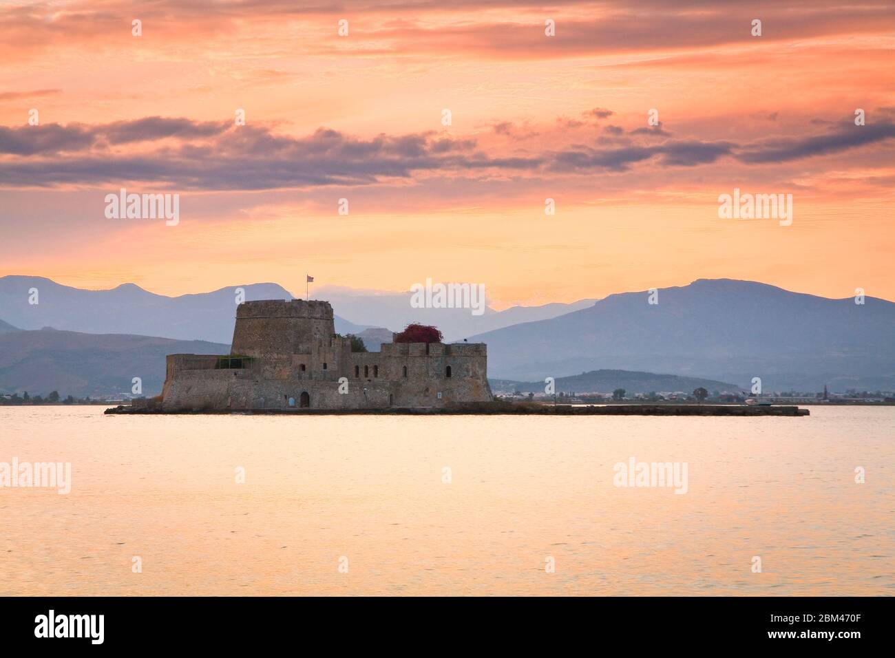 Evening view of Bourtzi castle in Nafplio, Greece Stock Photo - Alamy