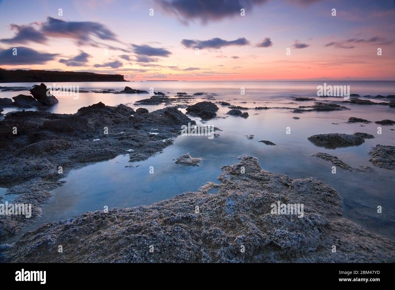Sunset on a beach in Crete, Greece Stock Photo - Alamy