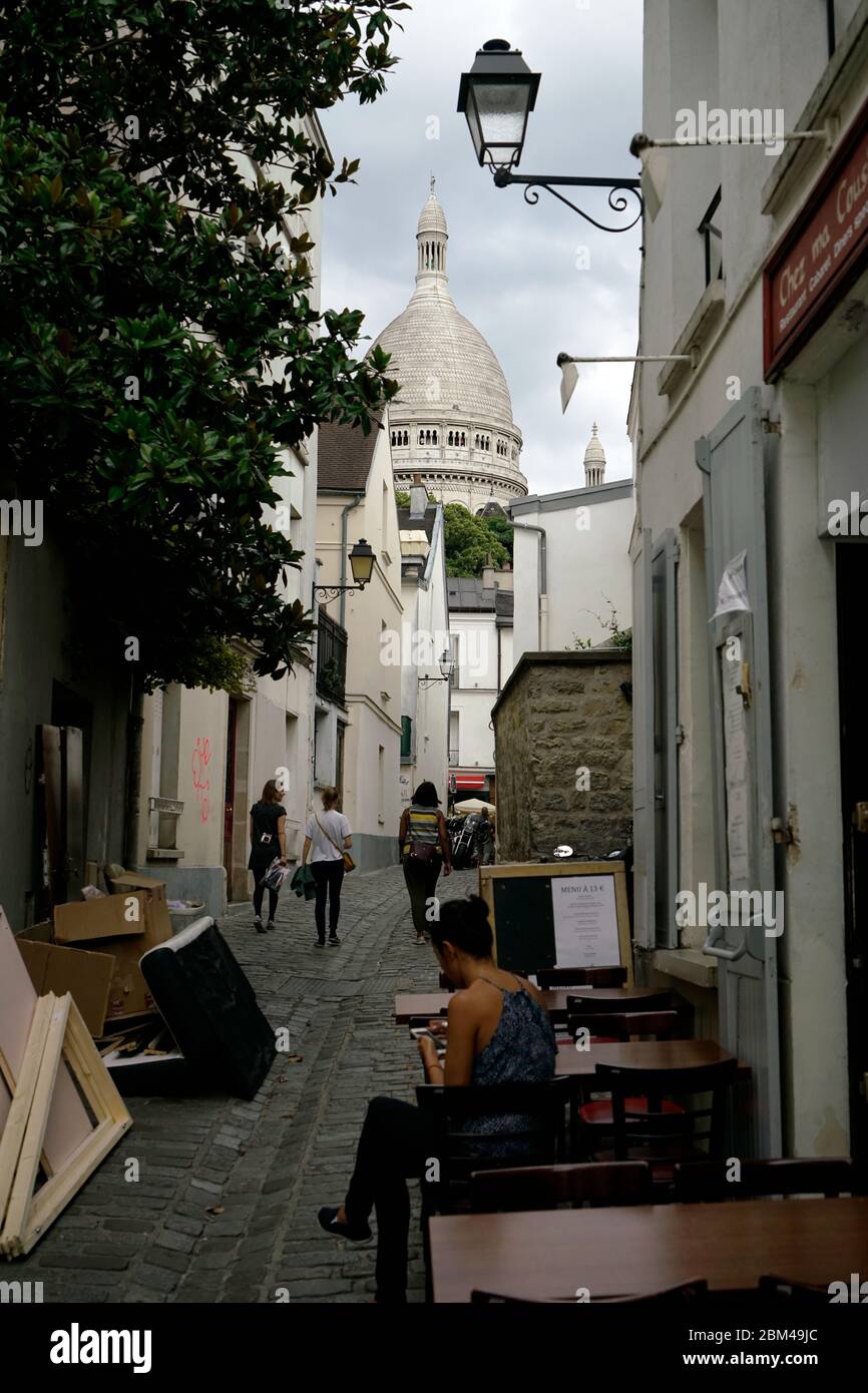 Rue Saint-Rustique the oldest street in Montmartre with the dome of ...