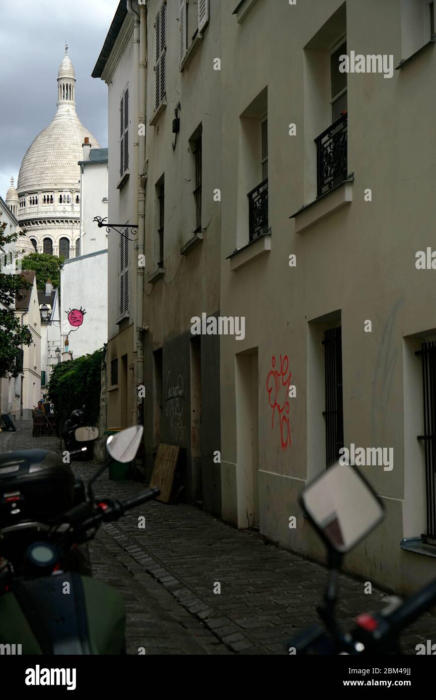 Rue Saint-Rustique the oldest street in Montmartre with the dome of ...