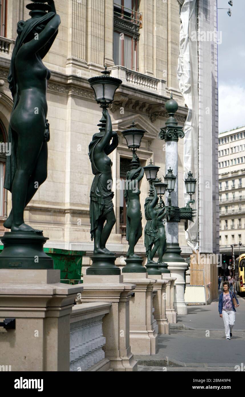 Bronze lamp post statues of the vestal virgins outside the Palais ...