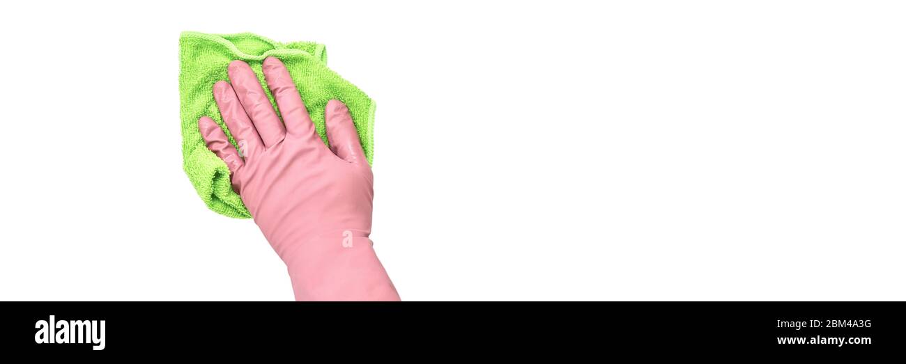 Hand in glove cleaning white wall with microfiber rag Stock Photo - Alamy